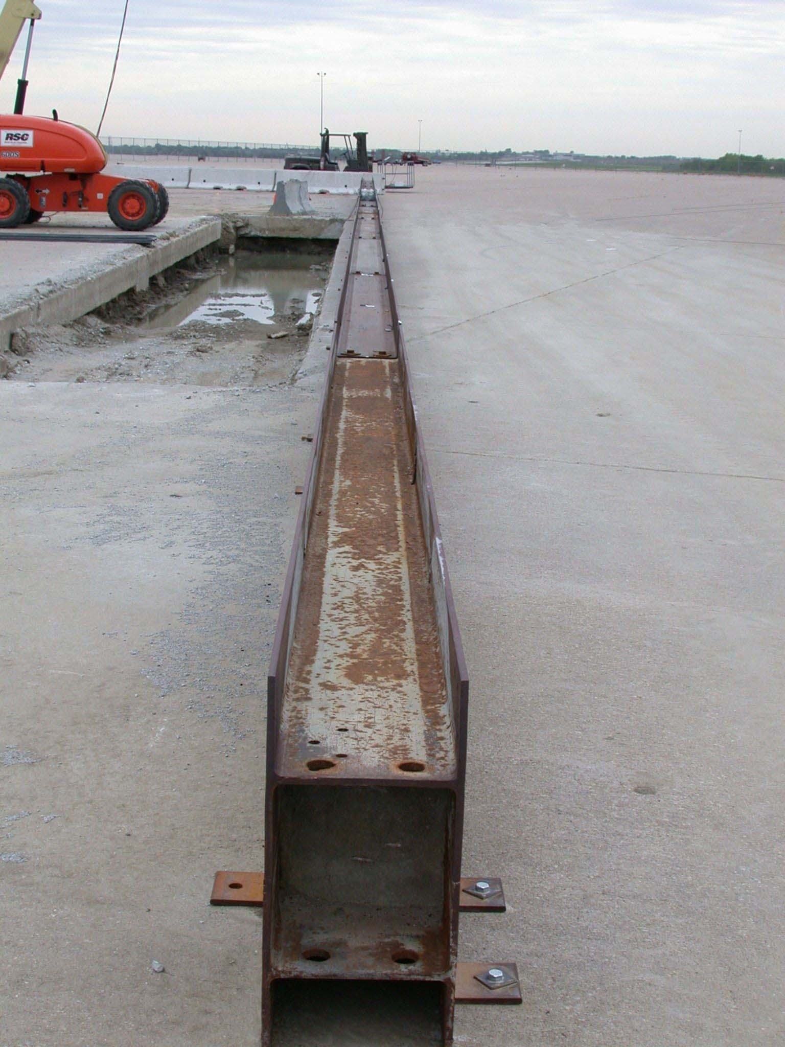 Bolted-Down, H-Pile, Steel Temporary Barrier System - Task Force 13